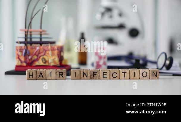 Word hair infection with pills and a microscope in laboratory ...