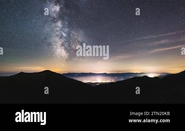 Magic Time lapse of Starry night sky in mountains with Milky way galaxy ...