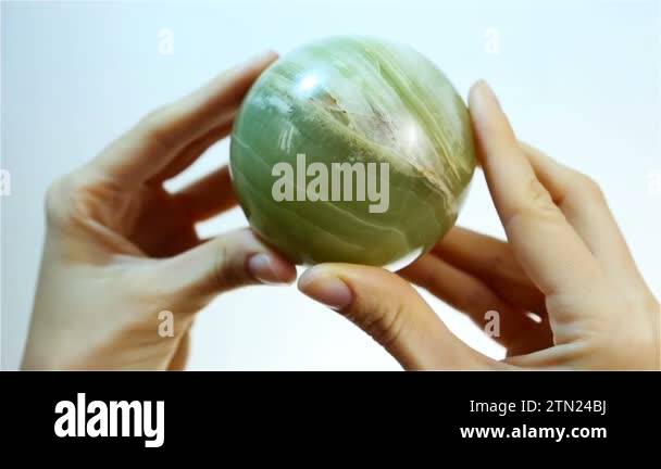 Hand holding marble Stock Videos & Footage - HD and 4K Video Clips - Alamy