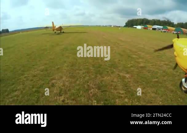 Flying in a light airplane. The camera is attached to the wing of the ...