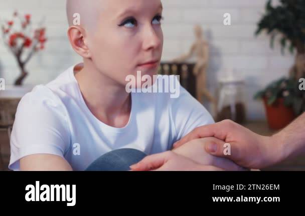 Sad, depressed cancer patient woman is supported by her husband Stock ...