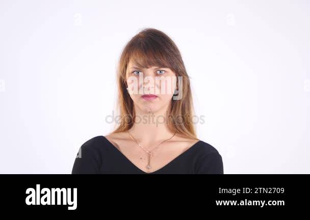 young woman, disgust on face, pinches nose looks funny, something ...