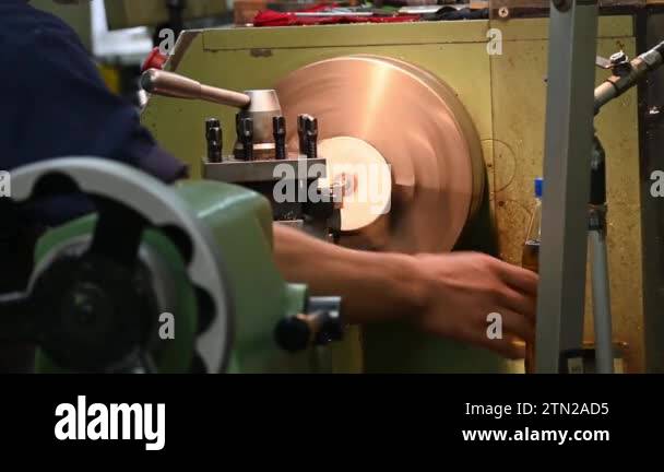 Pan scene the lathe machine finish cut the metal parts by lathe tools ...