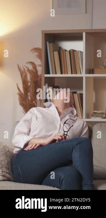 Vertical video. Tired rest. Home headache. Evening fatigue. Exhausted ...