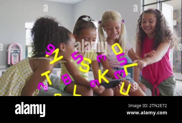 Animation of letters and numbers over happy diverse schoolgirls using ...