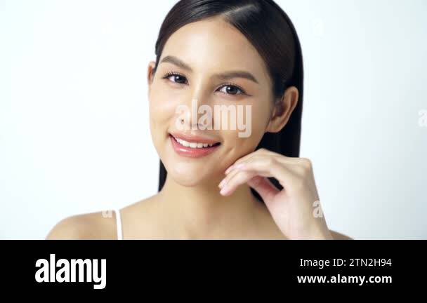 Beautiful Young asian Woman with Clean Fresh Skin on white background ...