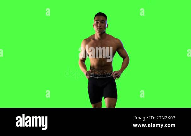 Sportsman energy runs on the green screen background. Front view Stock ...