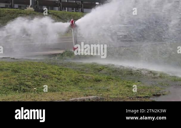Broken Fire Hydrant Spraying Water at Park and Street Flood Stock Video ...