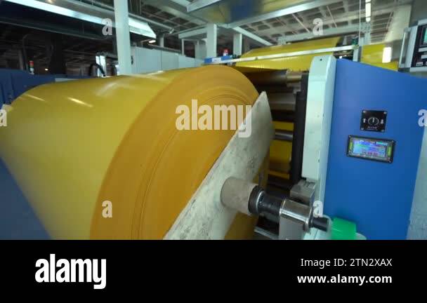 Duct tape production plant. Massive metal fasteners holding the ...