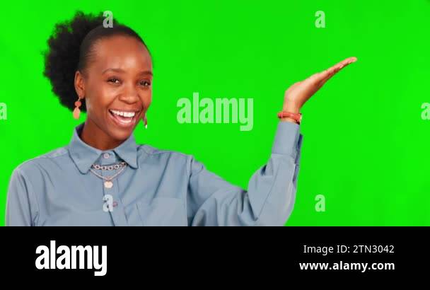 Palm presentation, face and black woman on green screen in studio isolated on a background ...