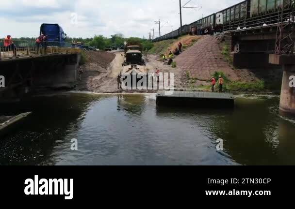 Pontoon bridge of the Ukrainian army. Installation of a temporary ...
