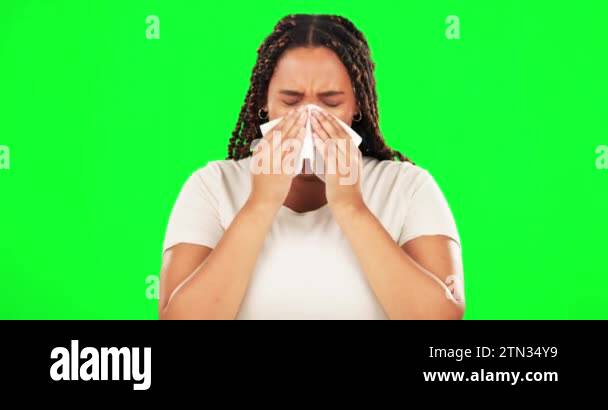 Black woman, blowing nose and sick on studio green screen with flu ...