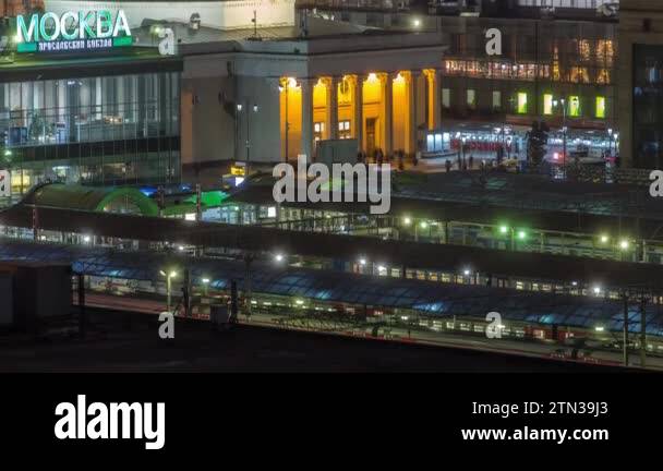 Evening top close up view of three railway stations night timelapse at ...
