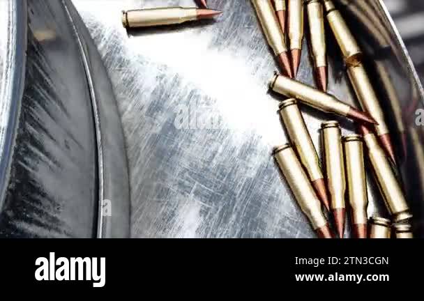 Process of production of bullets. Industrial concept. Factory equipment ...
