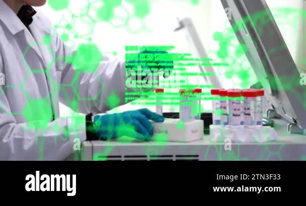 Animation of computer language, brain over biracial researcher placing ...