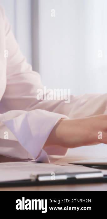 Vertical video. Computer job. Office worker. Keep records. Business ...