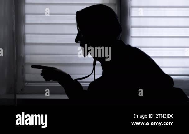 Unrecognizable Male in Anonymous Mask Showing Eye Contact Gesture in ...