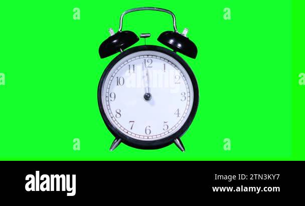 Alarm clock ringing at twelve oclock Stock Video Footage - Alamy