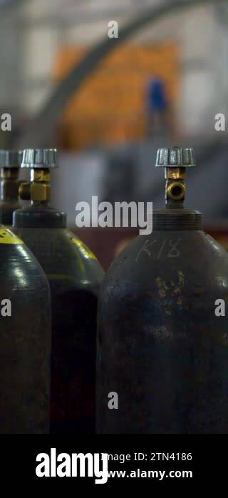 Oxygen cylinder with compressed gas. Black oxygen cylinders for welding ...