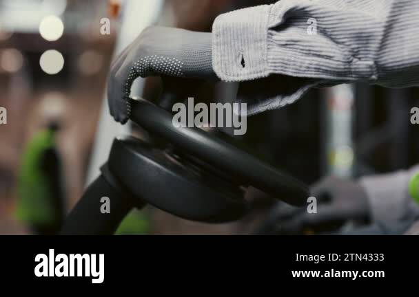 Close Up View of the Logistic Worker Hands Driving the Forklift. Man ...