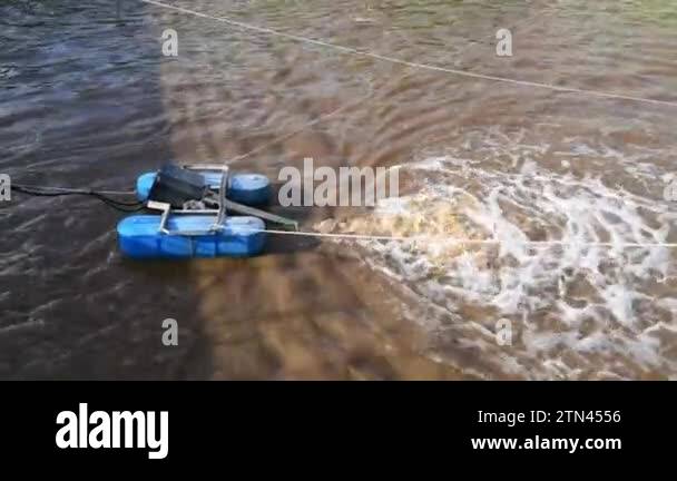 machine pumping sludge water mixed for residual methane escapes. sludge ...
