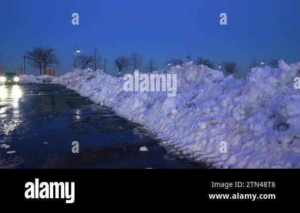This is a view of a tall snow bank at Canarsie Pier Park in Brooklyn ...
