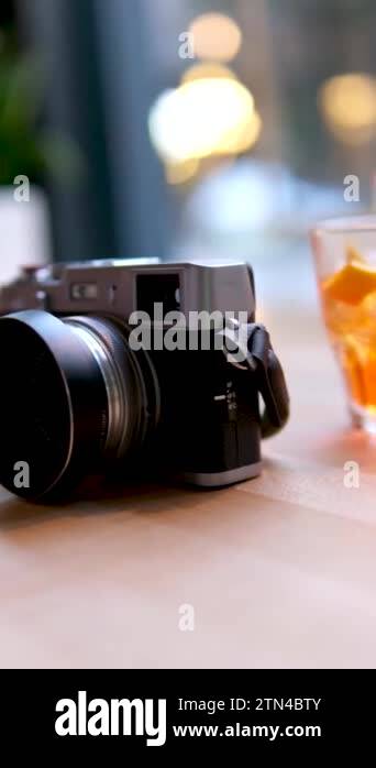 Woman hands toasting with aperol spritz cocktails, woman in bar take ...