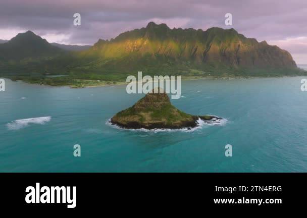 Drone shot of scenic green Chinamans hat island. Cinematic aerial ...