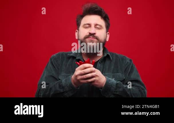 Man eating chilli Stock Videos & Footage - HD and 4K Video Clips - Alamy