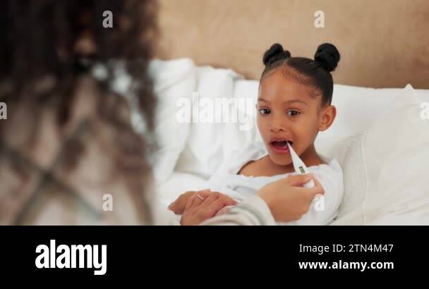 Sick child, bed and mother with a thermometer to check for a fever or temperature from the house ...