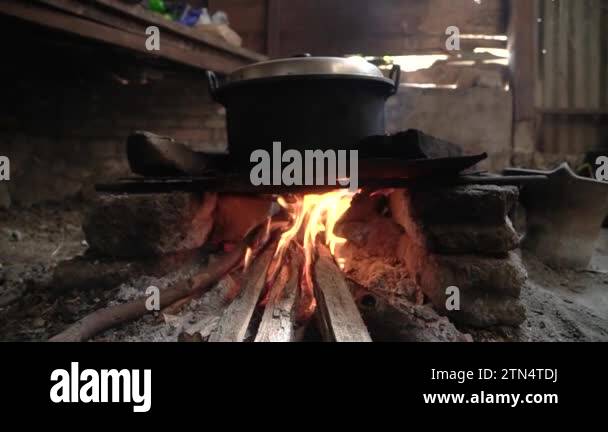 Cooking using traditional stoves in the countryside, the fuel uses wood ...