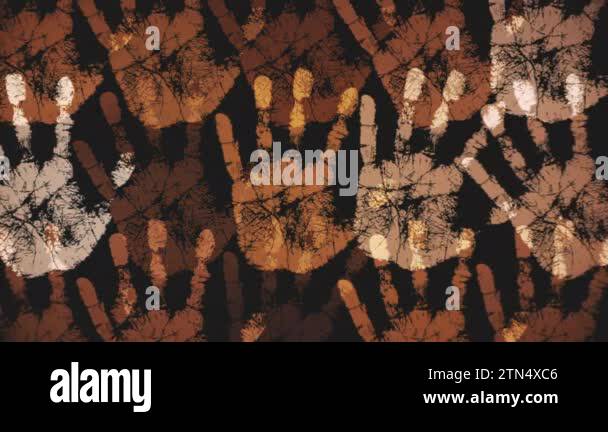 Abstract pattern background with a collection of handprints of various ...