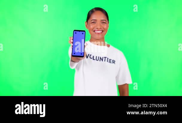 Woman, point at smartphone mockup and green screen, volunteer for ...