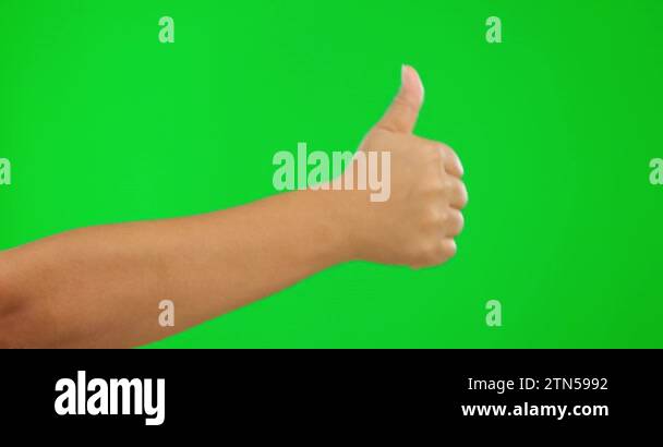 Thumbs up, hand and like with success, green screen and agreement ...