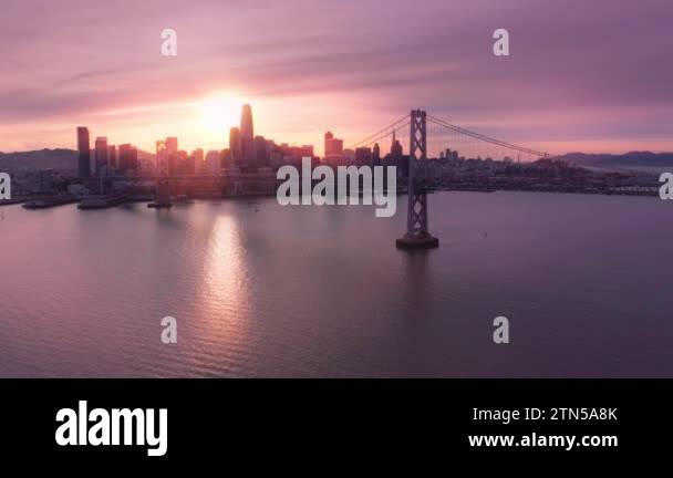 Beautiful aerial view of Bay Bridge with skyscrapers in downtown San ...
