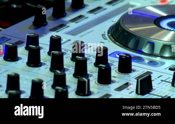 DJ mixer player. Close up DJ control sound console of disco. DJ control ...