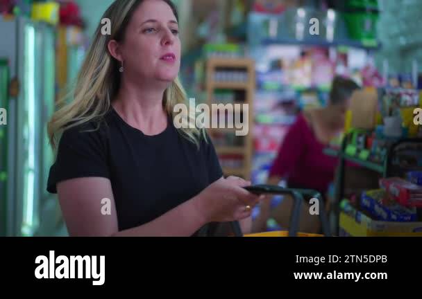 Female cashier customer supermarket checkout Stock Videos & Footage ...