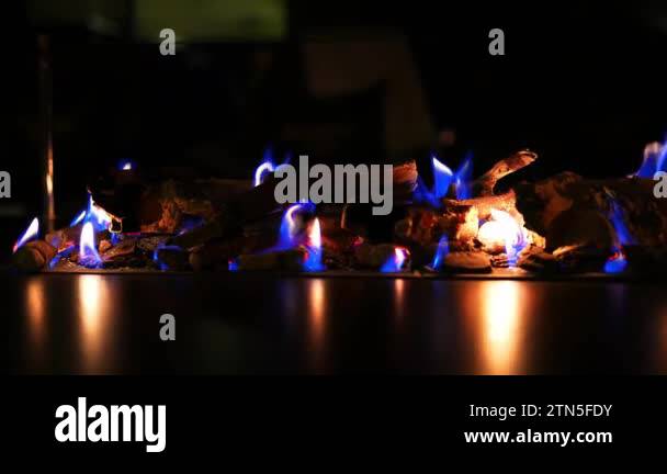 Fire line and fireplace in super slow motion on black, shooting with ...