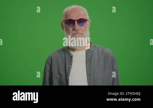Green Screen. An Angry Old Man in the Funny Glasses Shows a Prohibition ...
