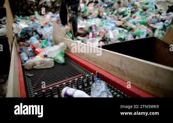 piles of plastic packaging bottles for recycling waste to be reused as ...