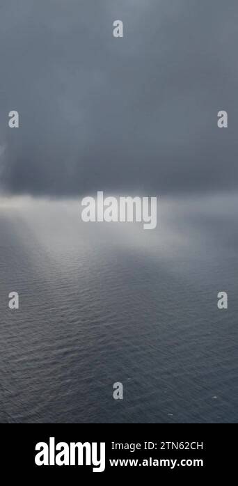 Experience the breathtaking drama of a cloudy sunset as the drone ...