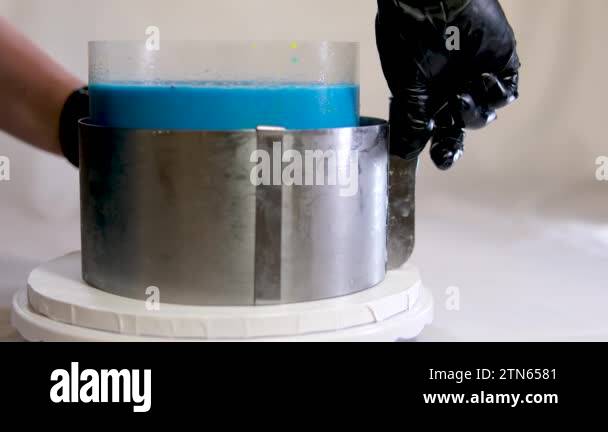 cake in form of Ukrainian flag yellow and blue layer process of making ...