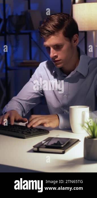 Vertical video. Online work. Busy man. Digital technology. Serious guy ...