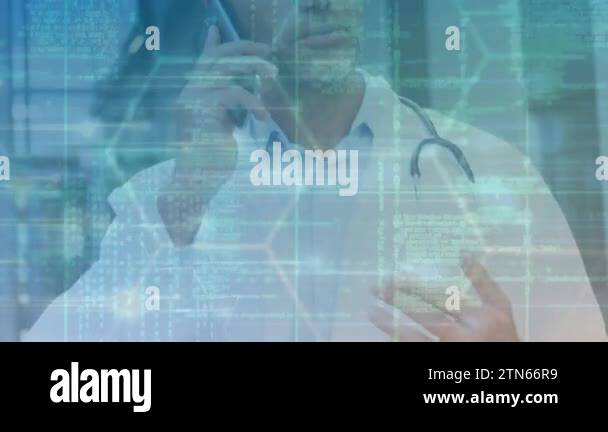 Animation of computer language and hexagon pattern over caucasian doctor talking on cellphone ...