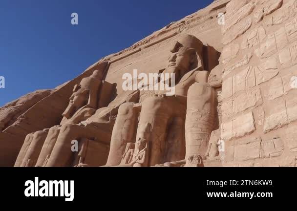 An ancient temple complex, cut into a solid rock cliff, Abu Simbel ...