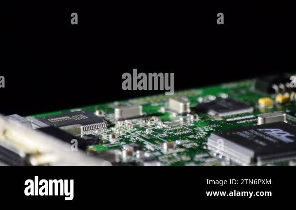 Electronic circuit board rotating at black background Stock Video ...