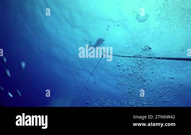 Pacific ocean, Costa Rica - September 5, 2021: Heroic diver descend by ...