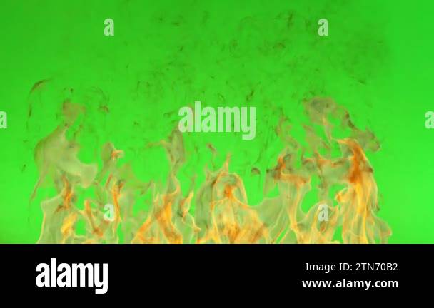 Super slow motion of fire flames on green screen background. Filmed on ...