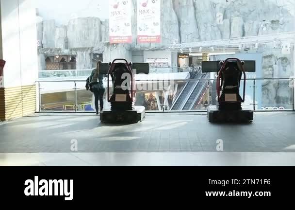 BUCHAREST, ROMANIA - CIRCA 2016: Multiple rigs of car simulator ...