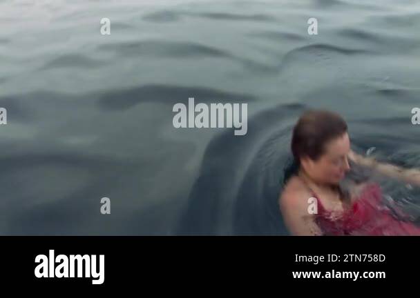 Free diver model in a red dress in water in Red Sea Stock Video Footage ...